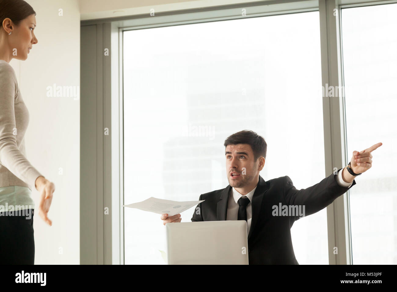 Strict business woman in office hi-res stock photography and images - Alamy