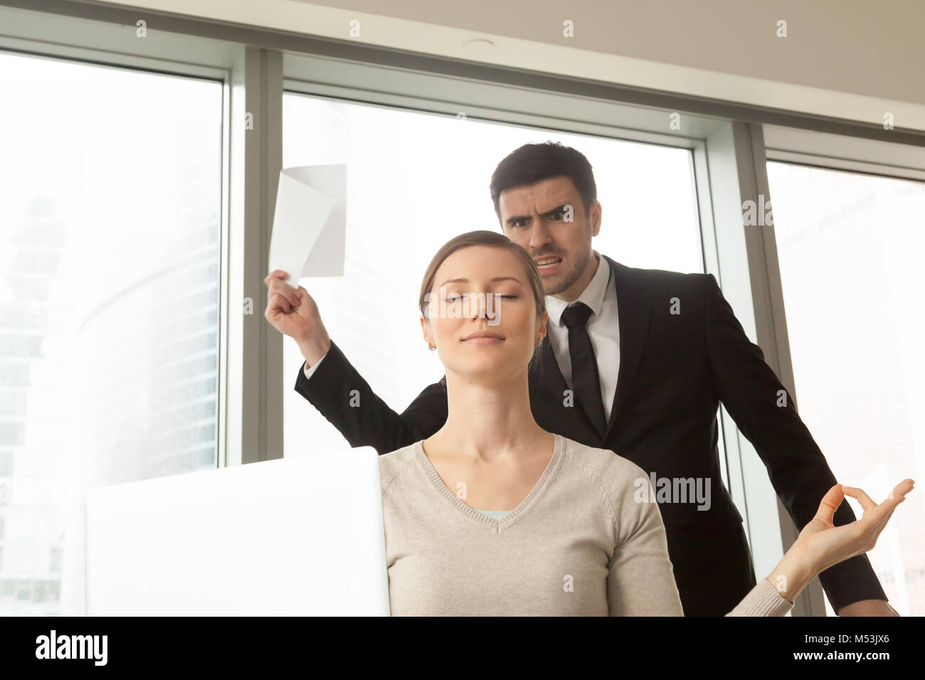 Female entrepreneur ignoring problems at work Stock Photo - Alamy