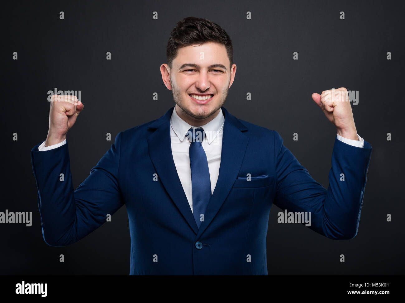 Excited happy manager celebrating his triumph in the new business Stock ...