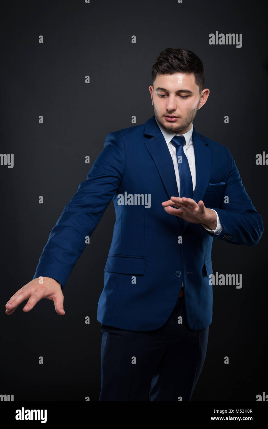 Businessman making a refuse gesture with his hand being afraid of ...