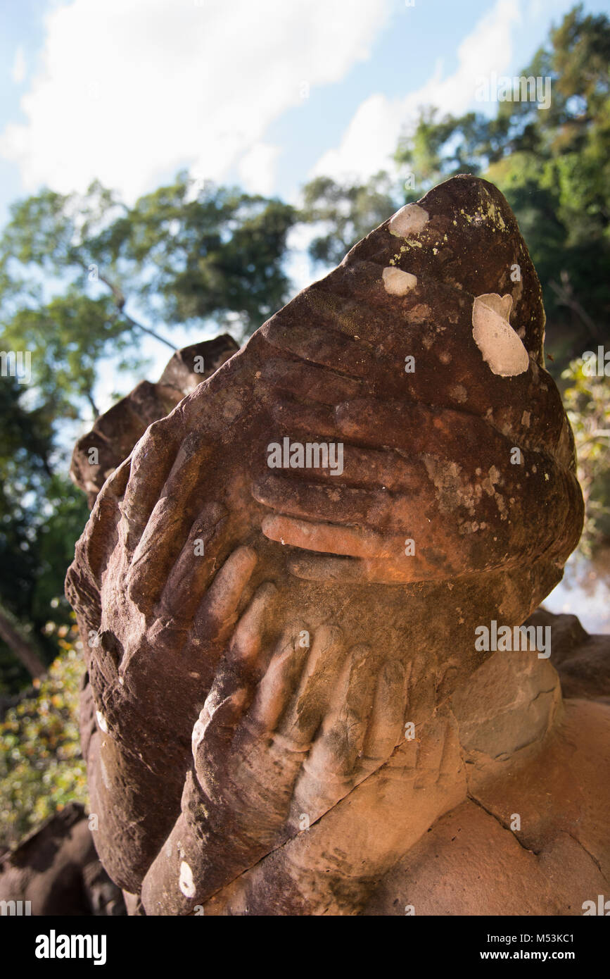 Sculpture of hands offering in supplication Stock Photo - Alamy