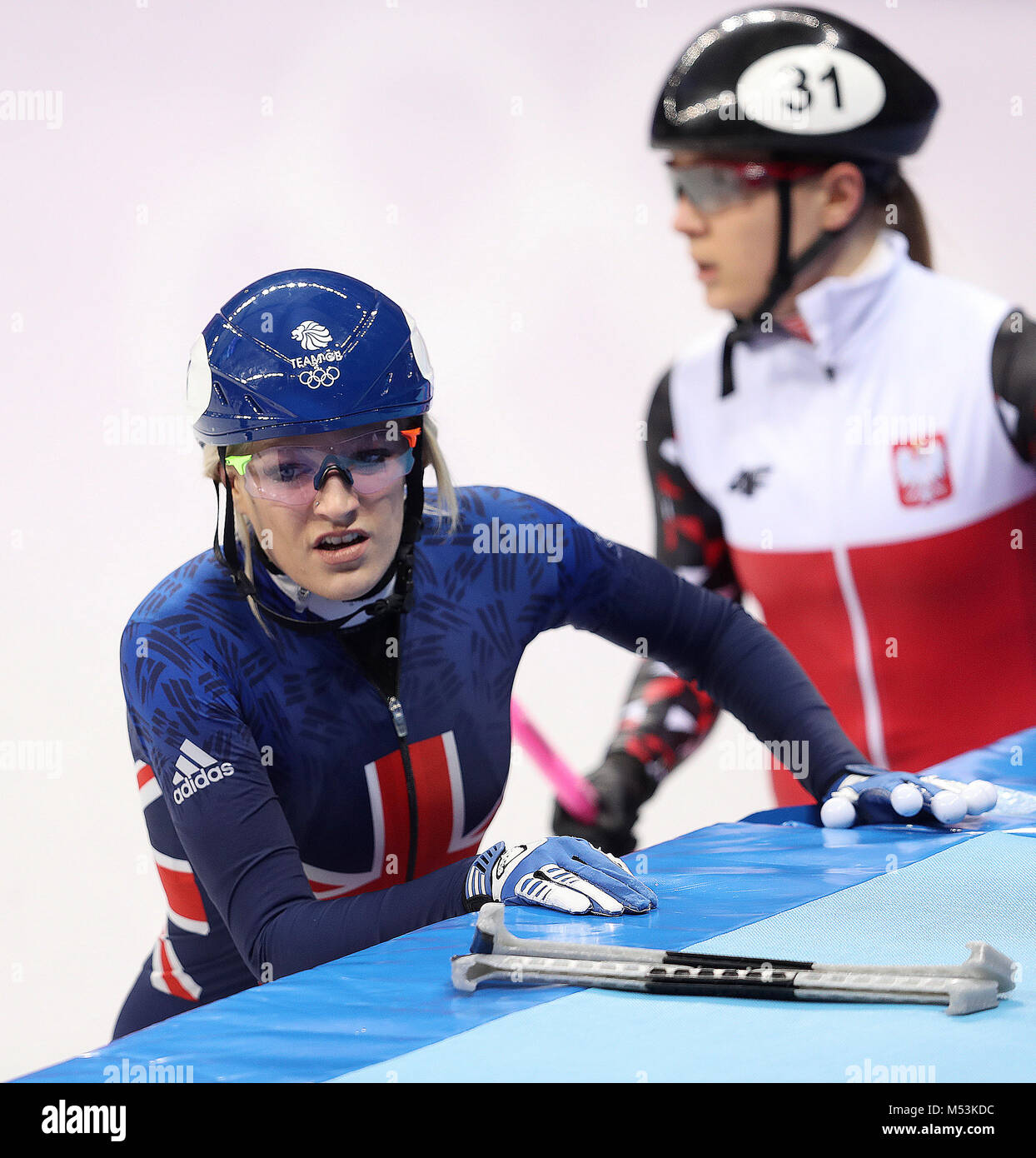Great Britain's Elise Christie leaves the ice after being disqualified ...