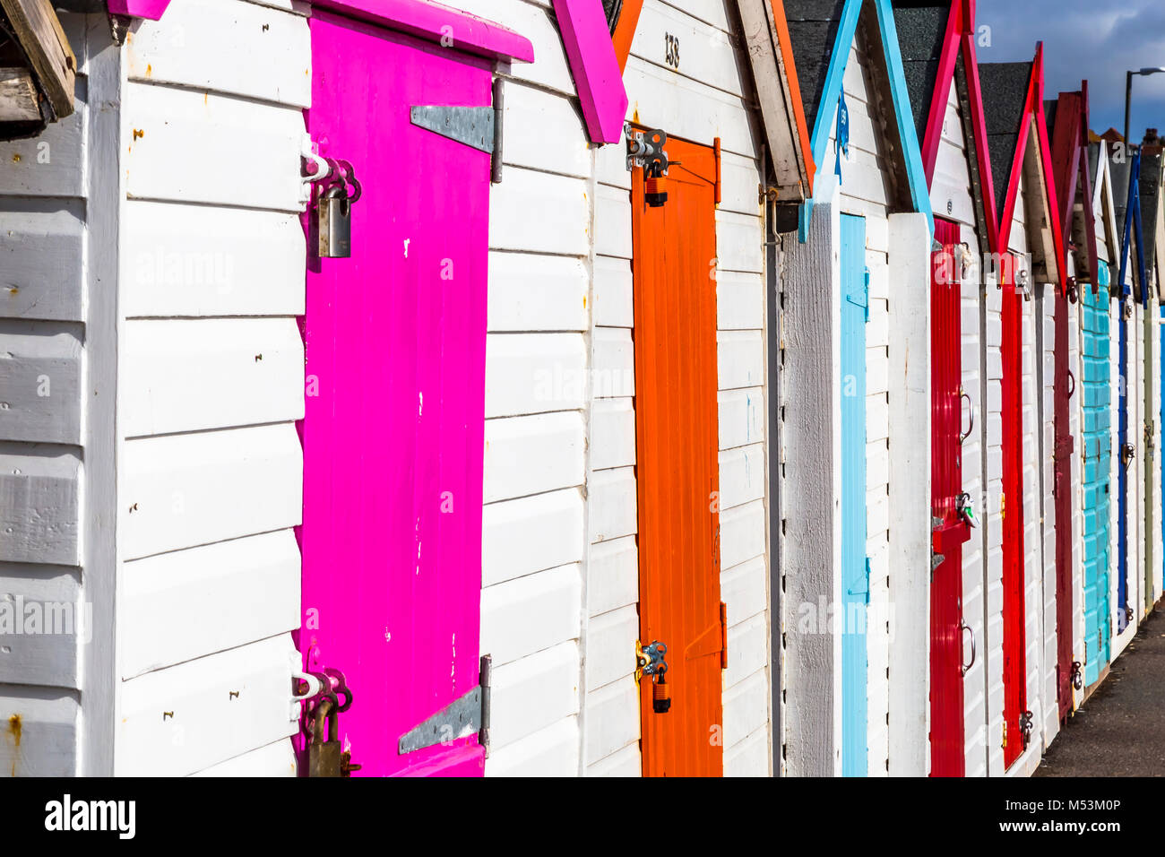 ch changing huts for swimming and sun bathing in the UK Stock Photo - Alamy