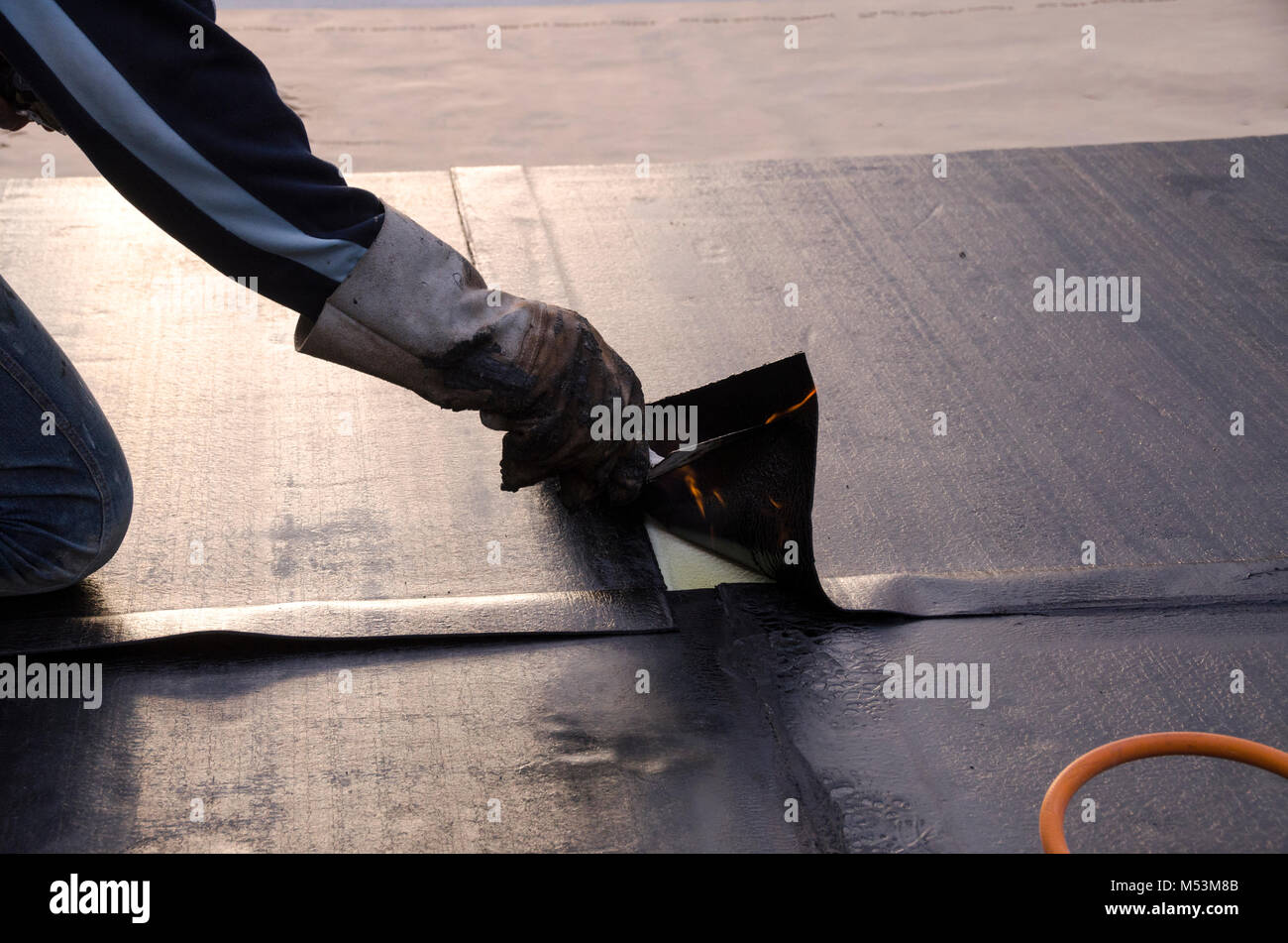 laying of waterproofing sheathing and insulation during the renovation ...