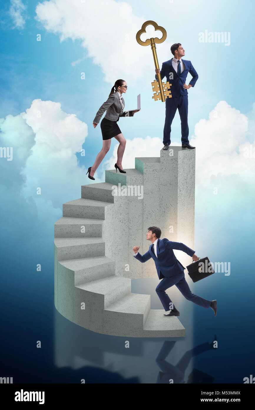 Businessman with key to success at the top of career Stock Photo - Alamy
