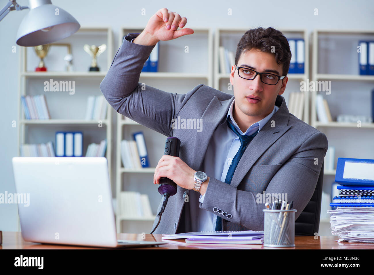 Businessman sweating excessively smelling bad in office at workp Stock ...