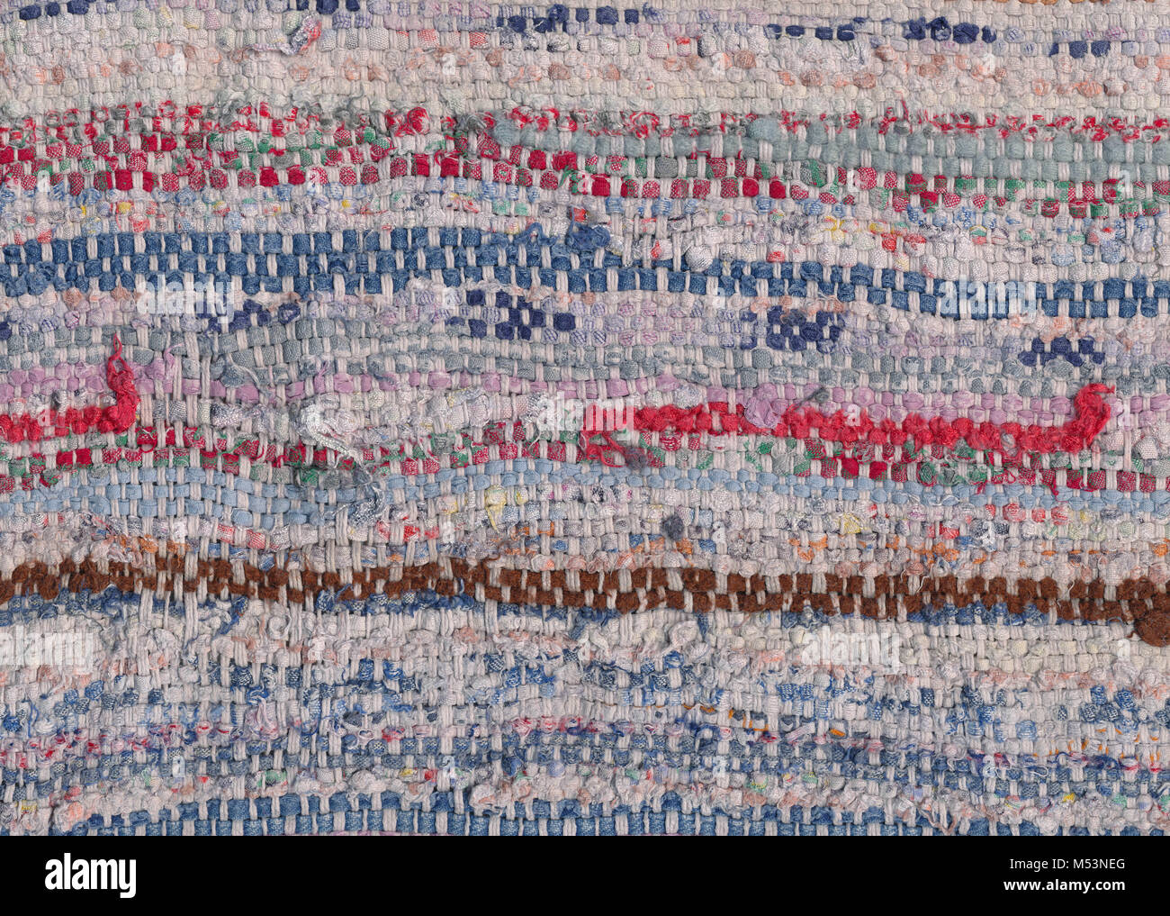 Old used woven rag rug Stock Photo - Alamy