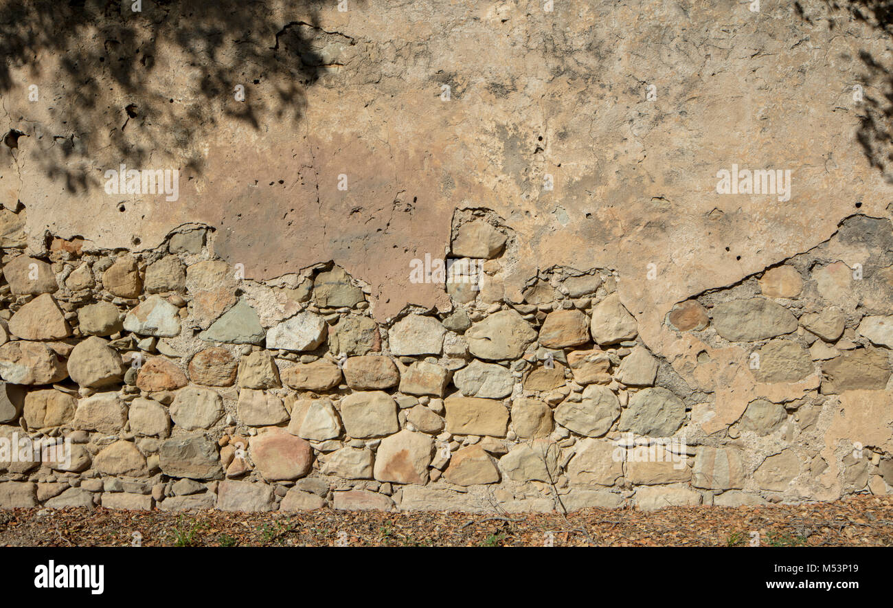 A detail shot of an old sandstone wall with eroding features Stock ...