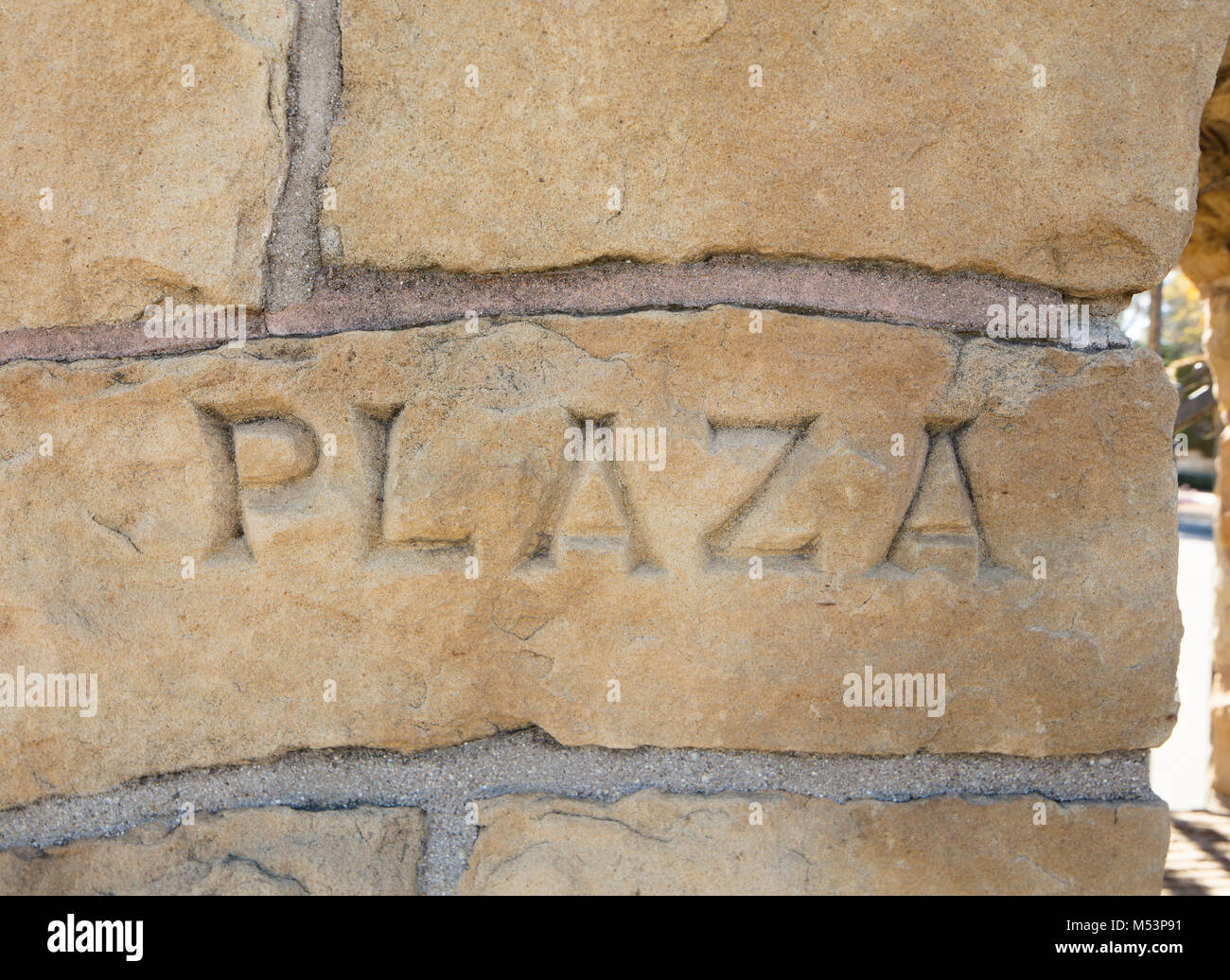 Detail photo of hand chiseled word in sandstone Stock Photo - Alamy