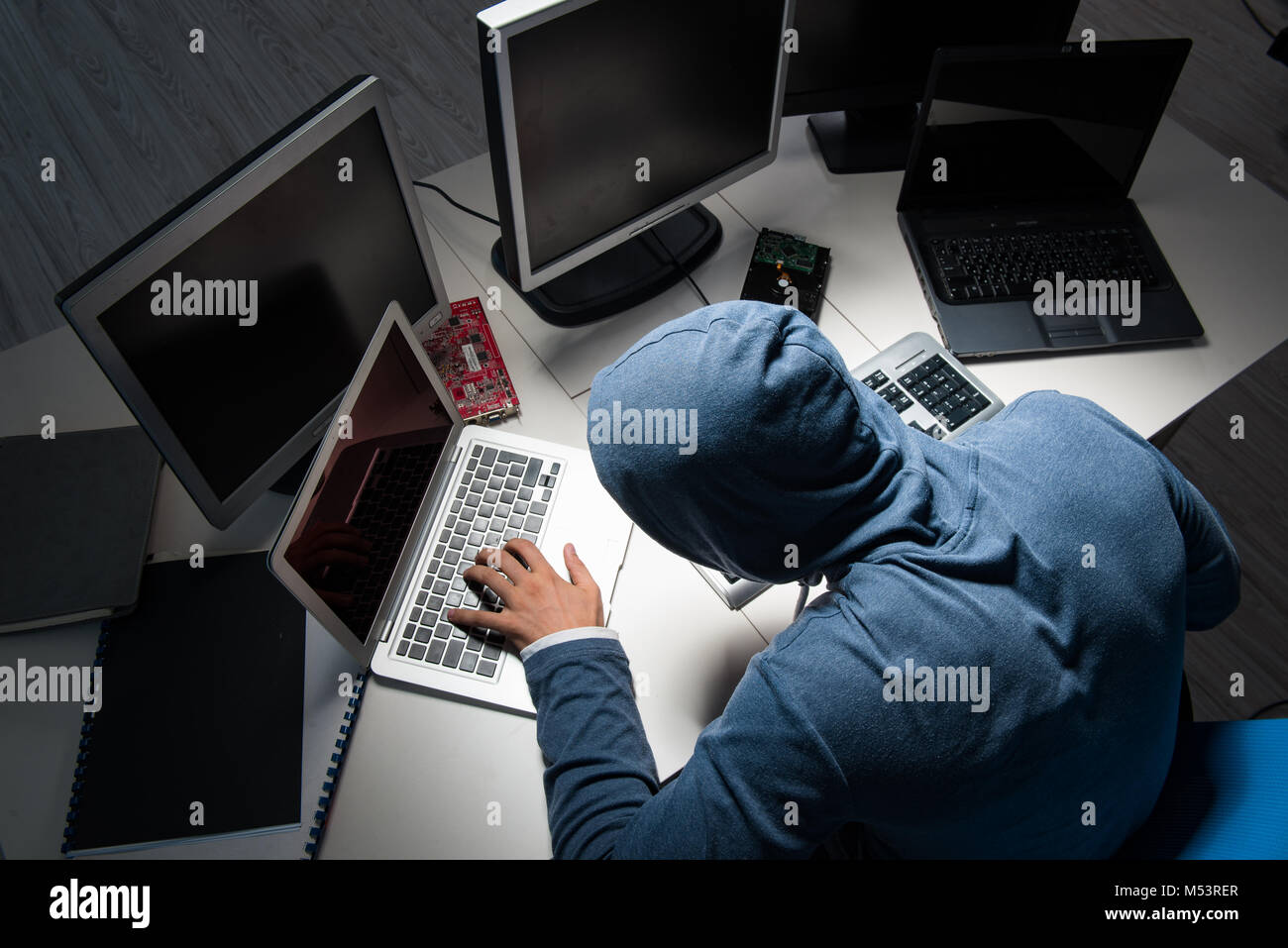 Hacker hacking computer at night Stock Photo - Alamy