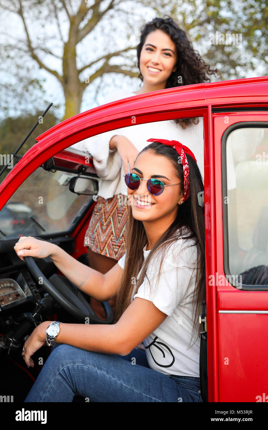 Two friends going on a roadtrip through countryside Stock Photo - Alamy