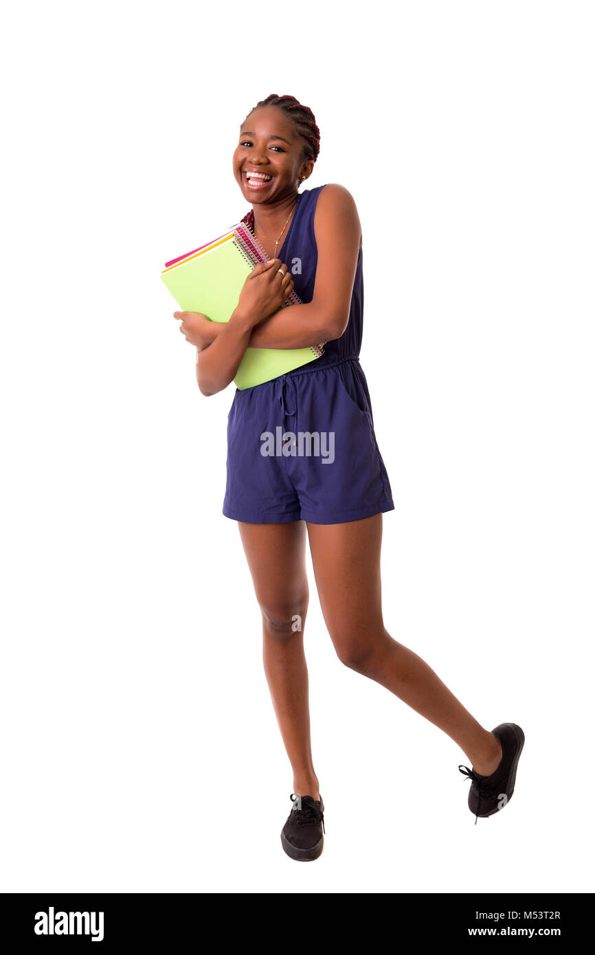 Beautiful african student woman posing isolated over white background ...