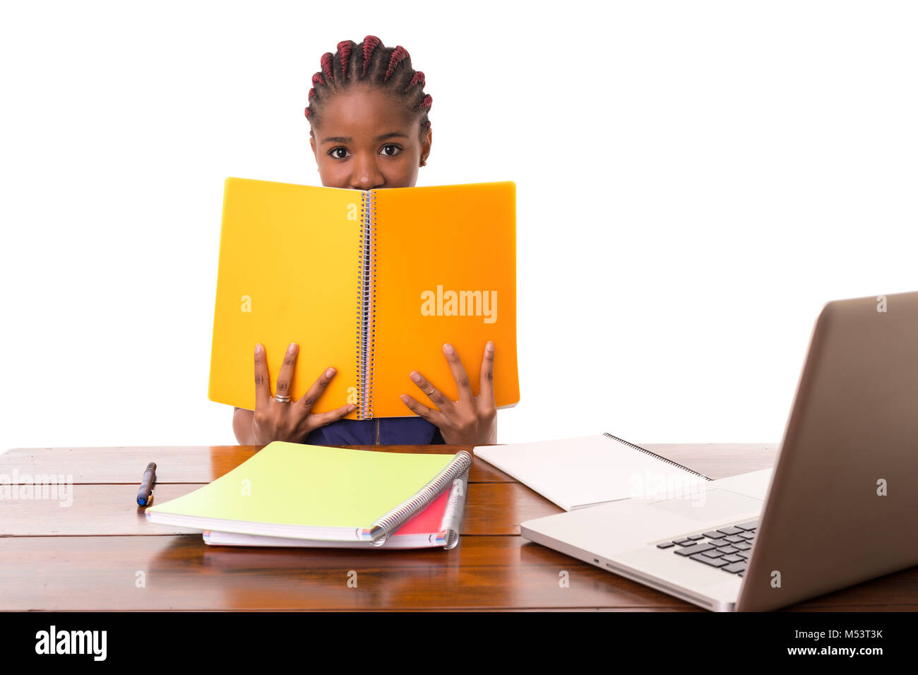 Beautiful african student woman posing isolated over white background ...