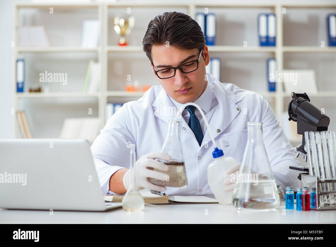 Young researcher scientist doing a water test contamination expe Stock ...