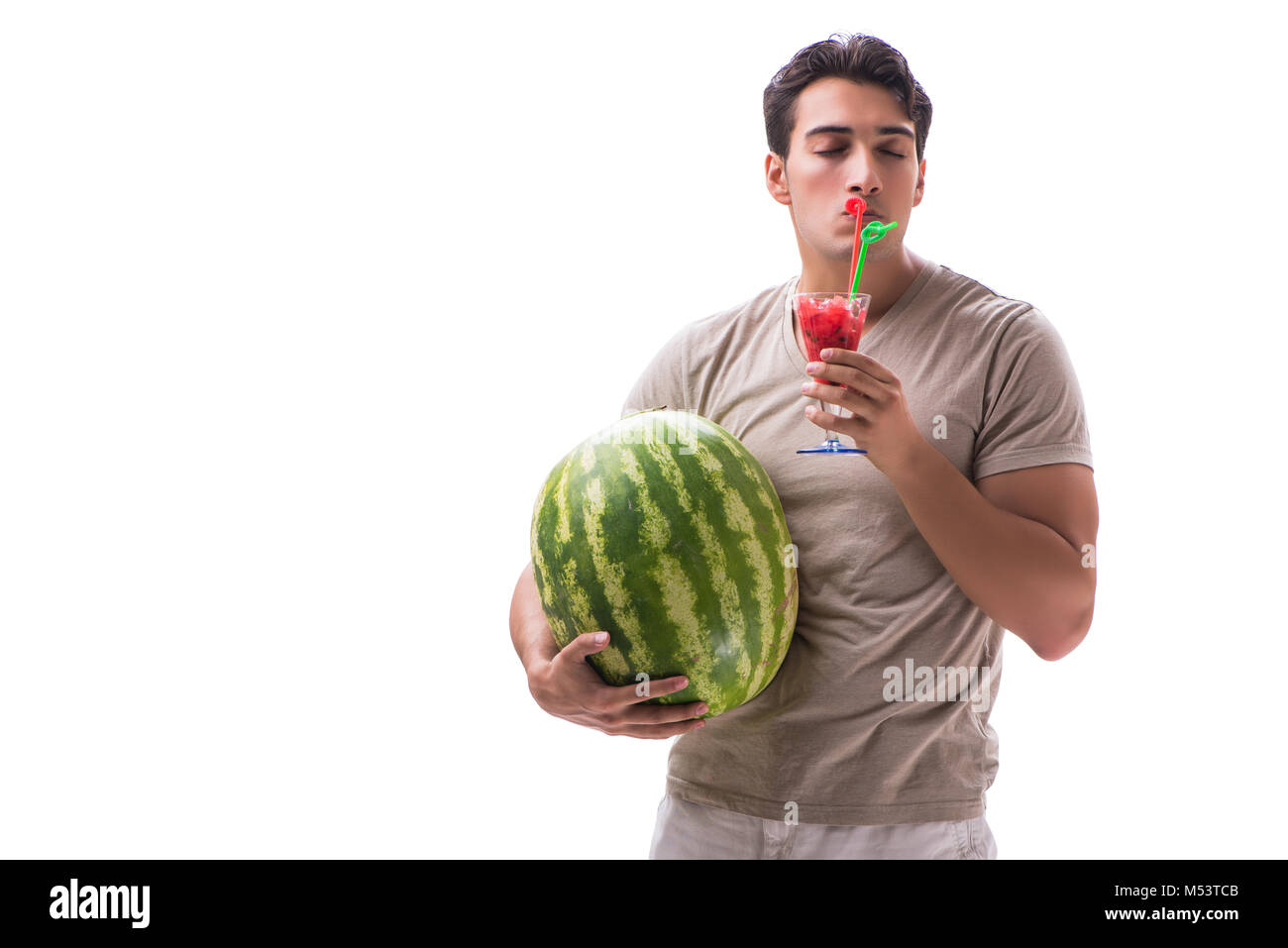 Young man with watermelon isolated on white Stock Photo - Alamy