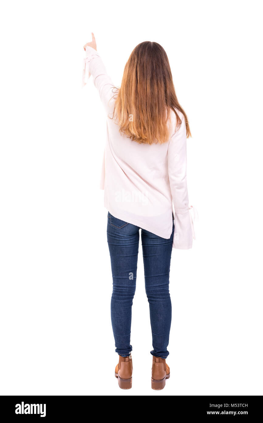 Woman posing with her back faced to camera, isolated over copy space ...