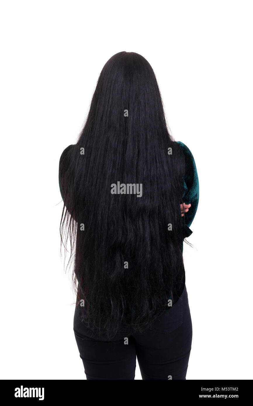 Woman posing with her back faced to camera, isolated over copy space ...