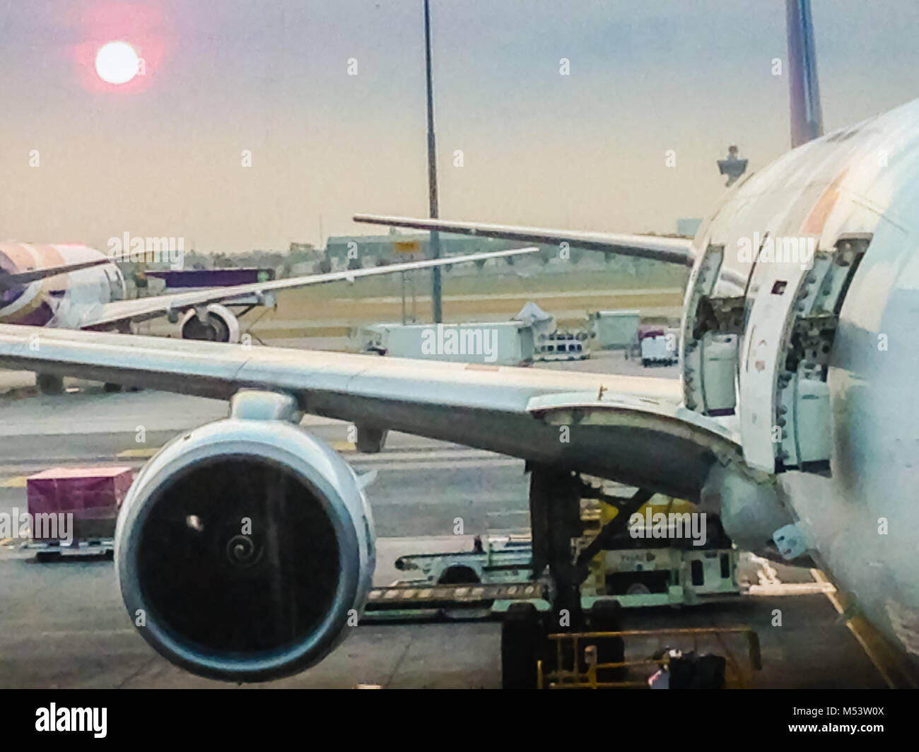 Airplane at the terminal gate ready for takeoff in modern international ...