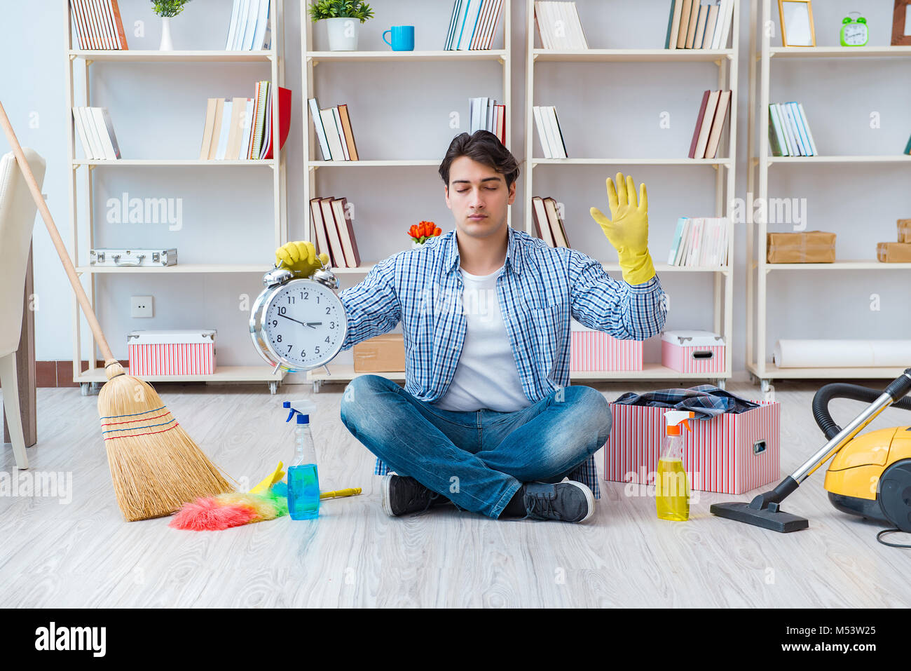 Man doing cleaning at home Stock Photo - Alamy