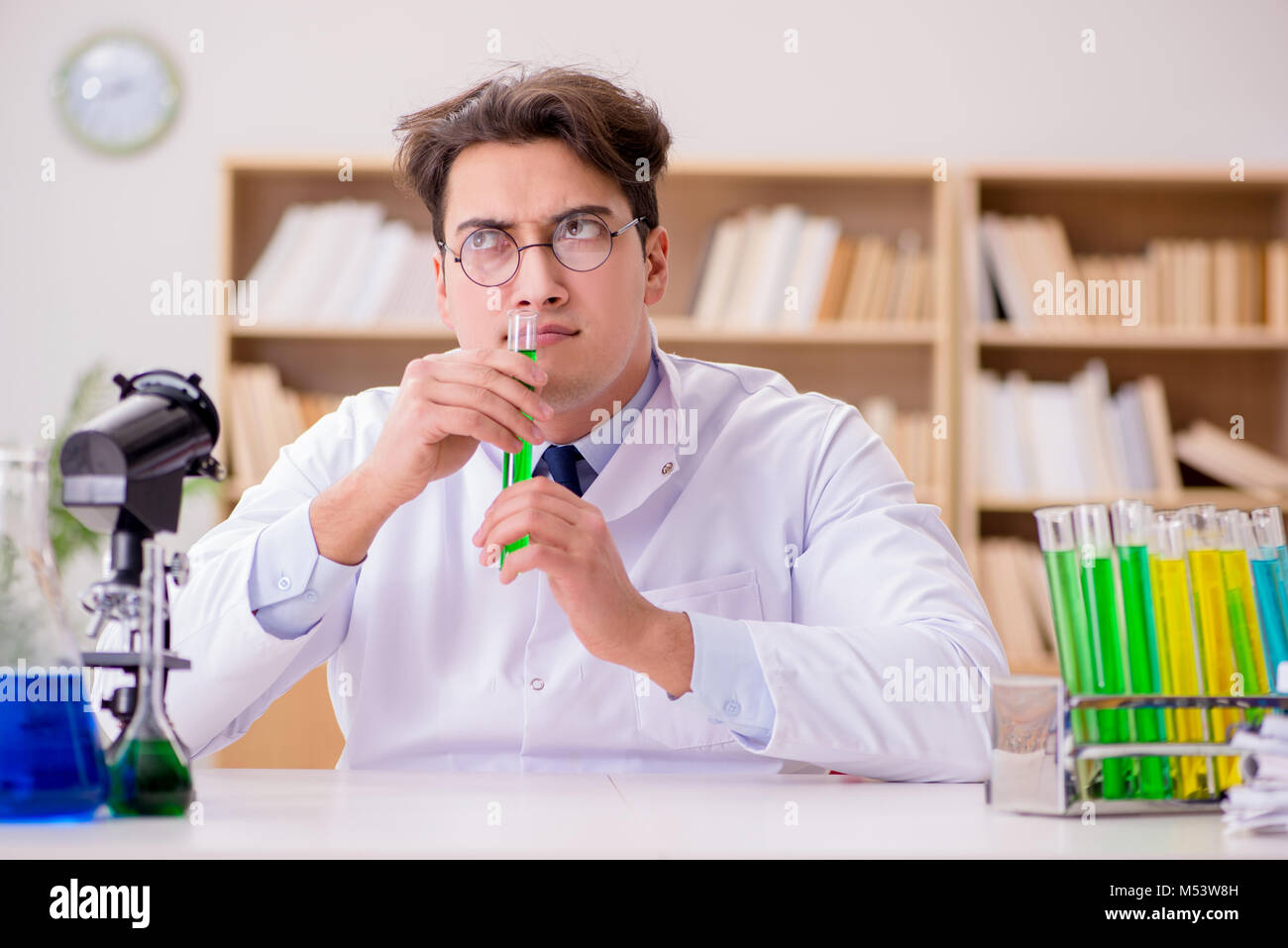 Mad crazy scientist doctor doing experiments in a laboratory Stock ...