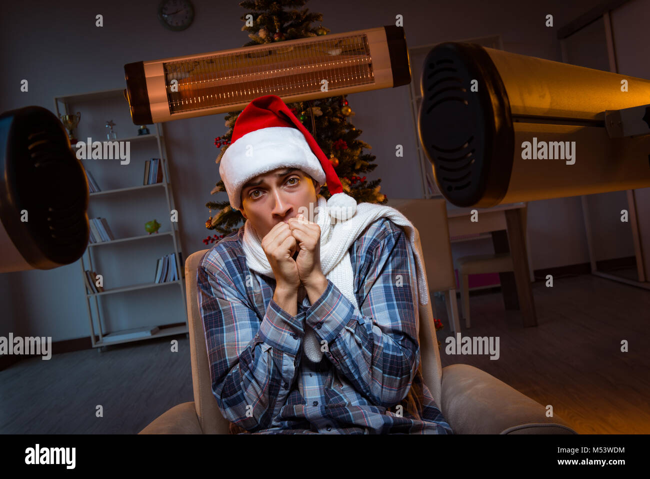 Man suffering from cold at home Stock Photo - Alamy