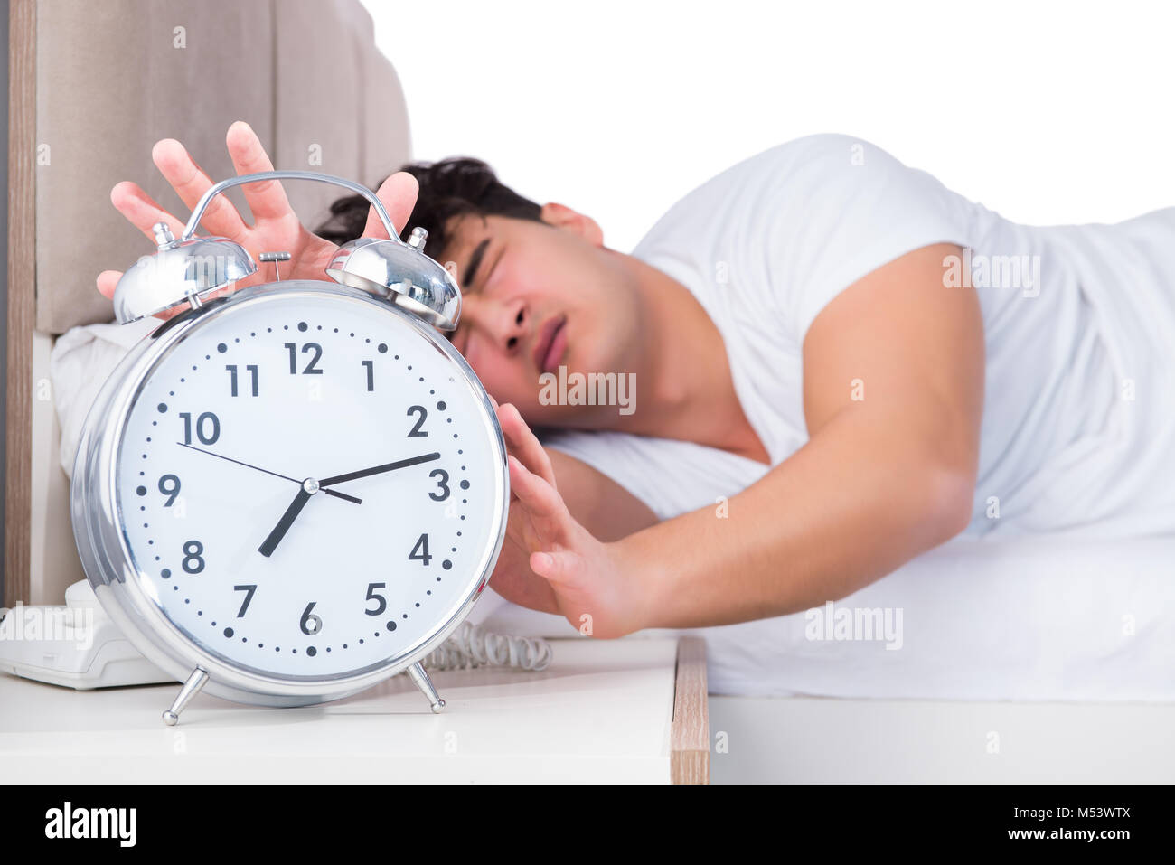 Man in bed suffering from insomnia Stock Photo - Alamy