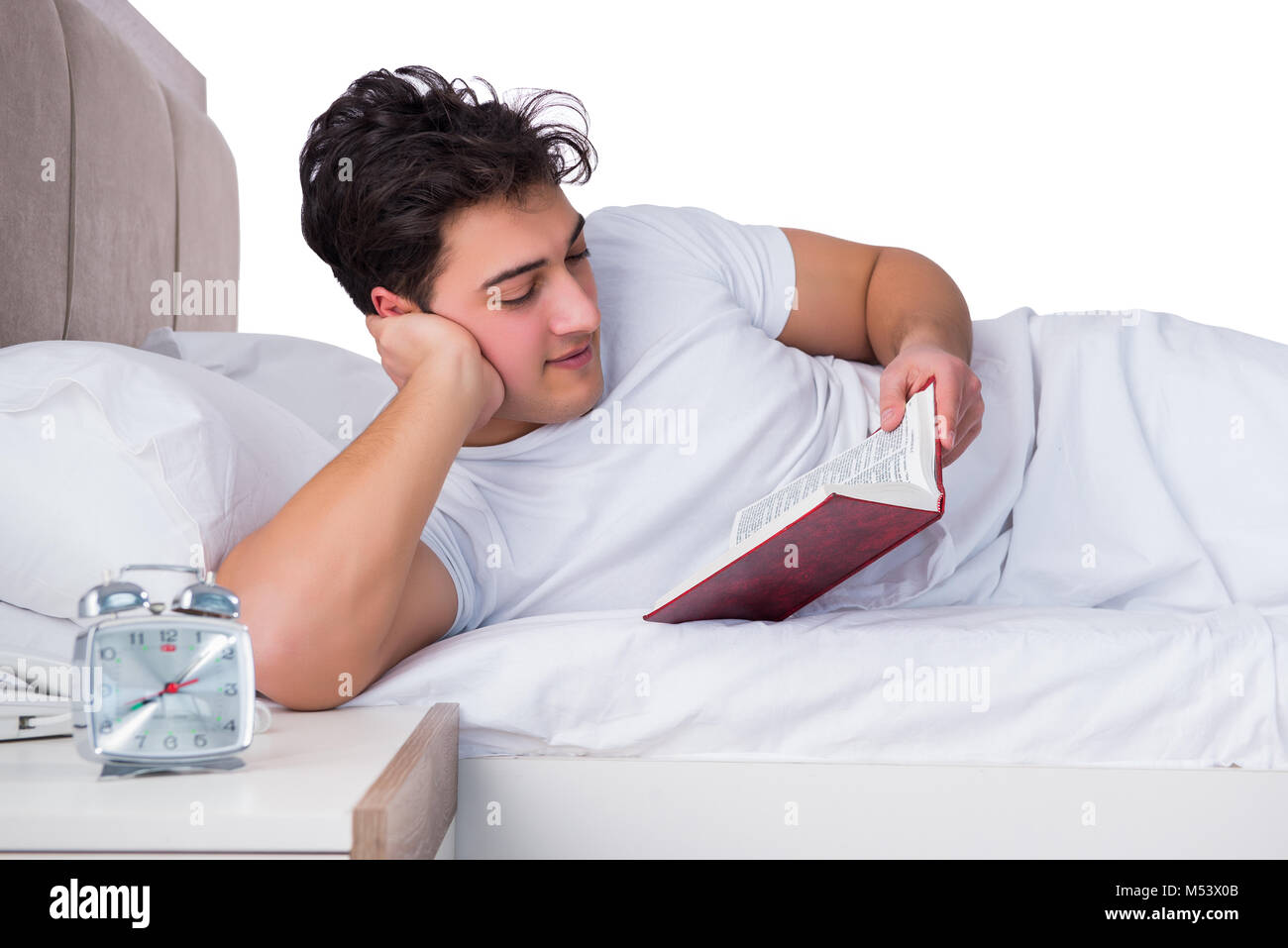 Man in bed suffering from insomnia Stock Photo - Alamy