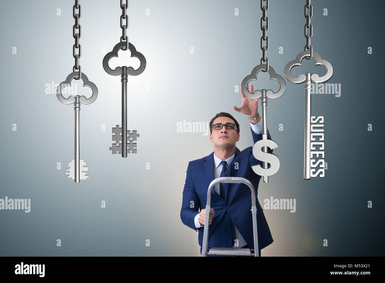 Businessman in key to financial success concept Stock Photo - Alamy