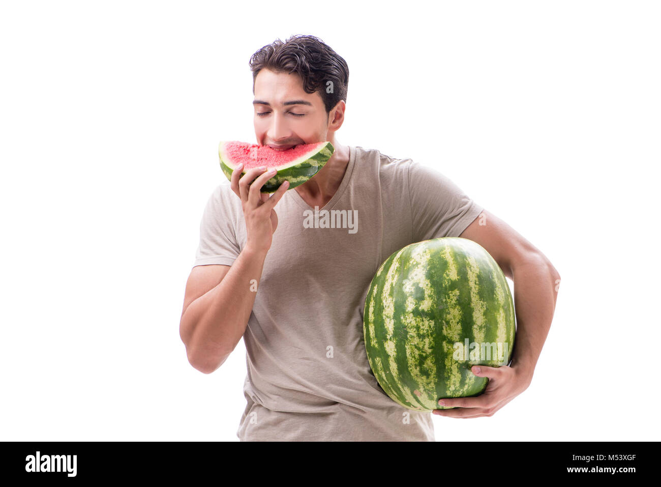 Young man with watermelon isolated on white Stock Photo - Alamy