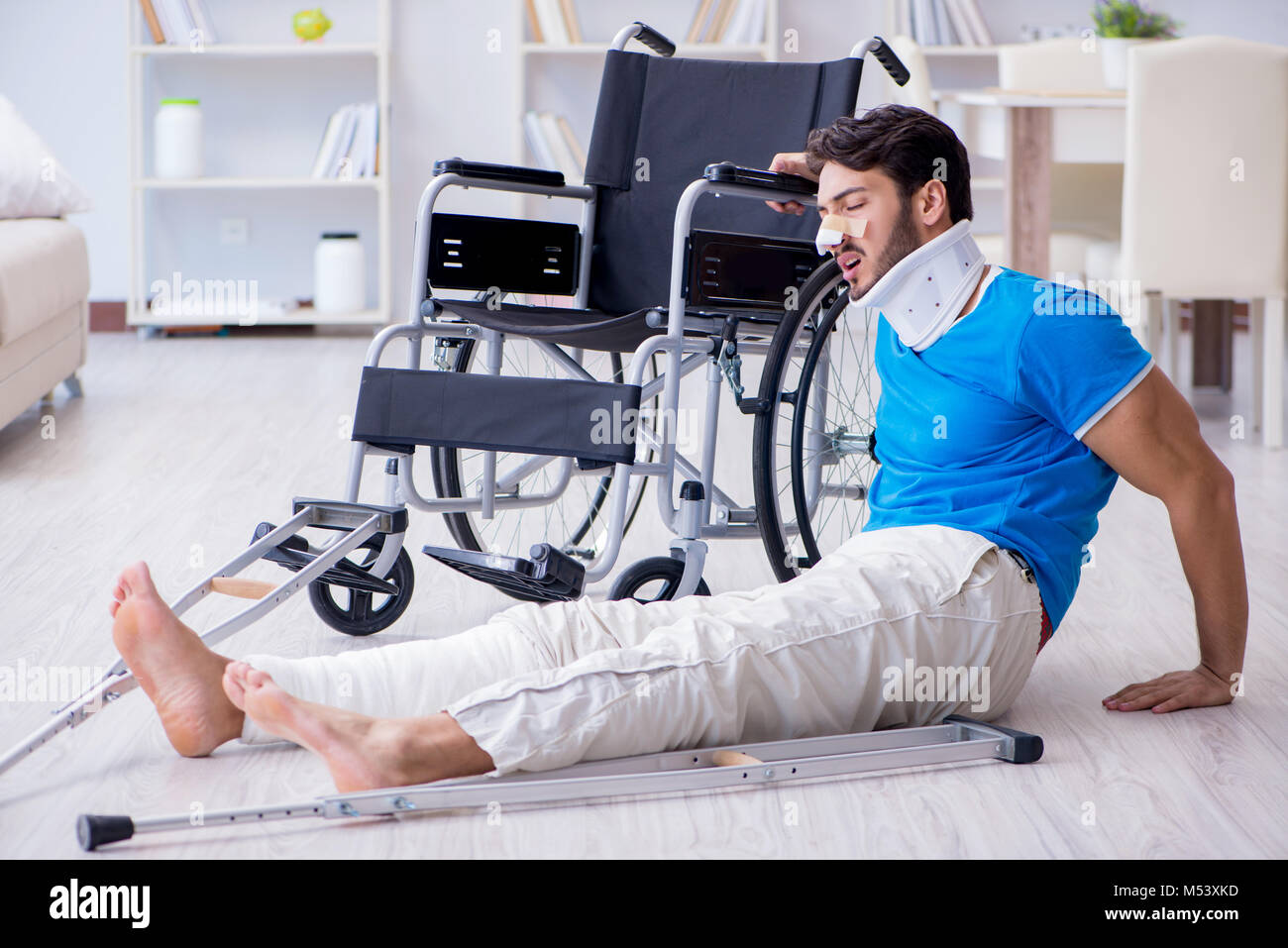 Injured young man recovering at home Stock Photo - Alamy