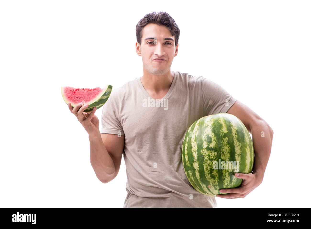Young man with watermelon isolated on white Stock Photo - Alamy
