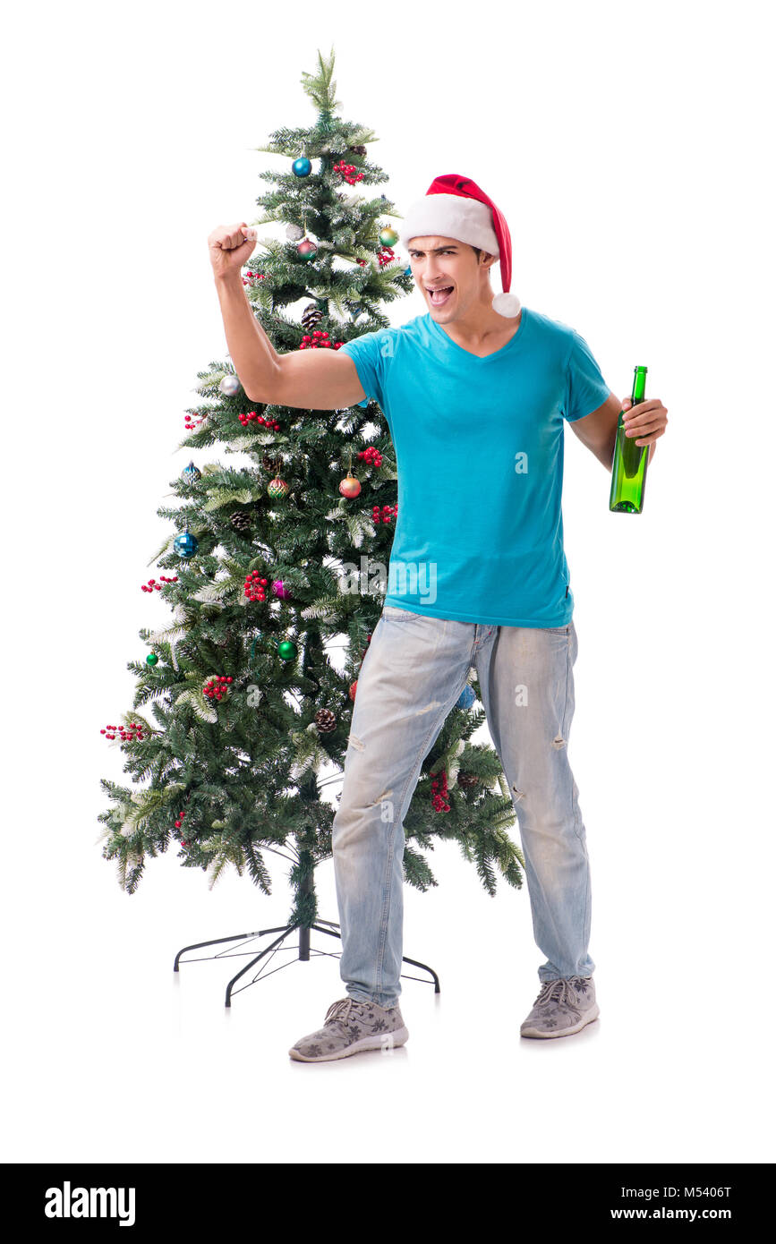 Young man decorating christmas tree isolated on white Stock Photo - Alamy