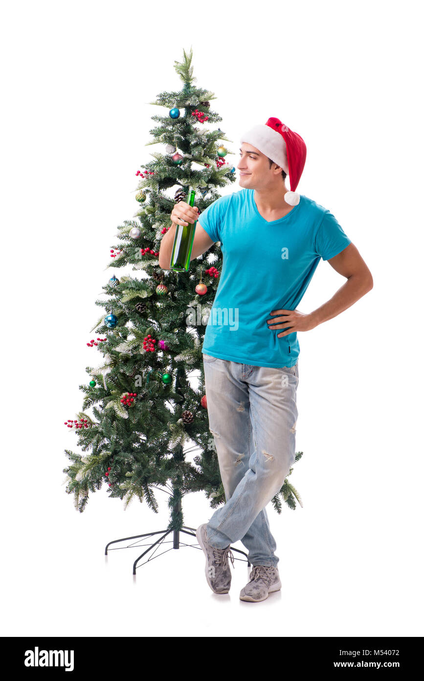 Young man decorating christmas tree isolated on white Stock Photo - Alamy