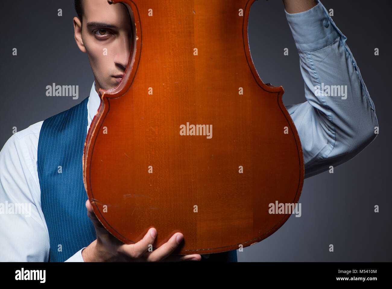 Cello player in music room hi-res stock photography and images - Alamy