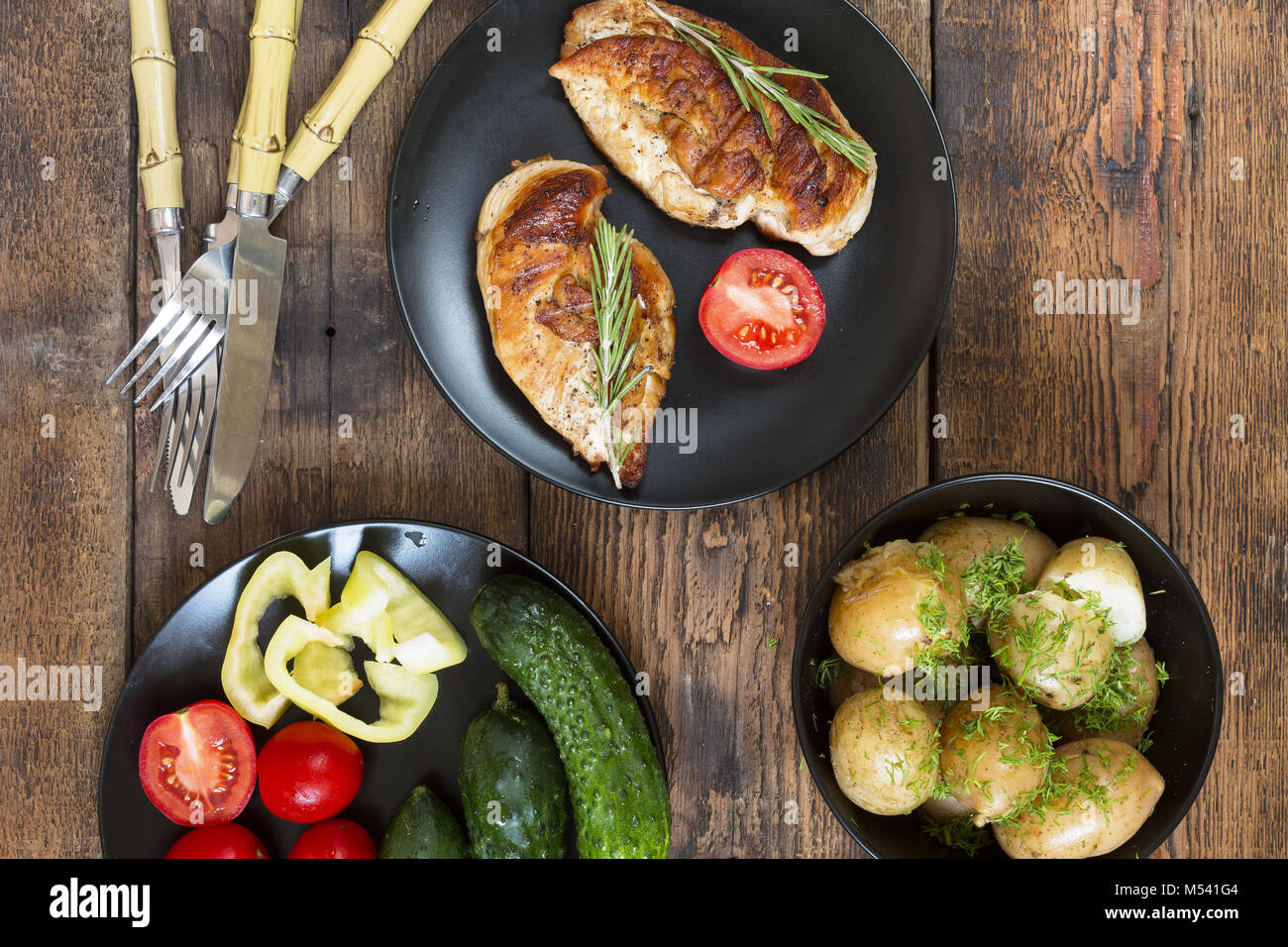 Authentic European dinner with young potatoes Stock Photo - Alamy