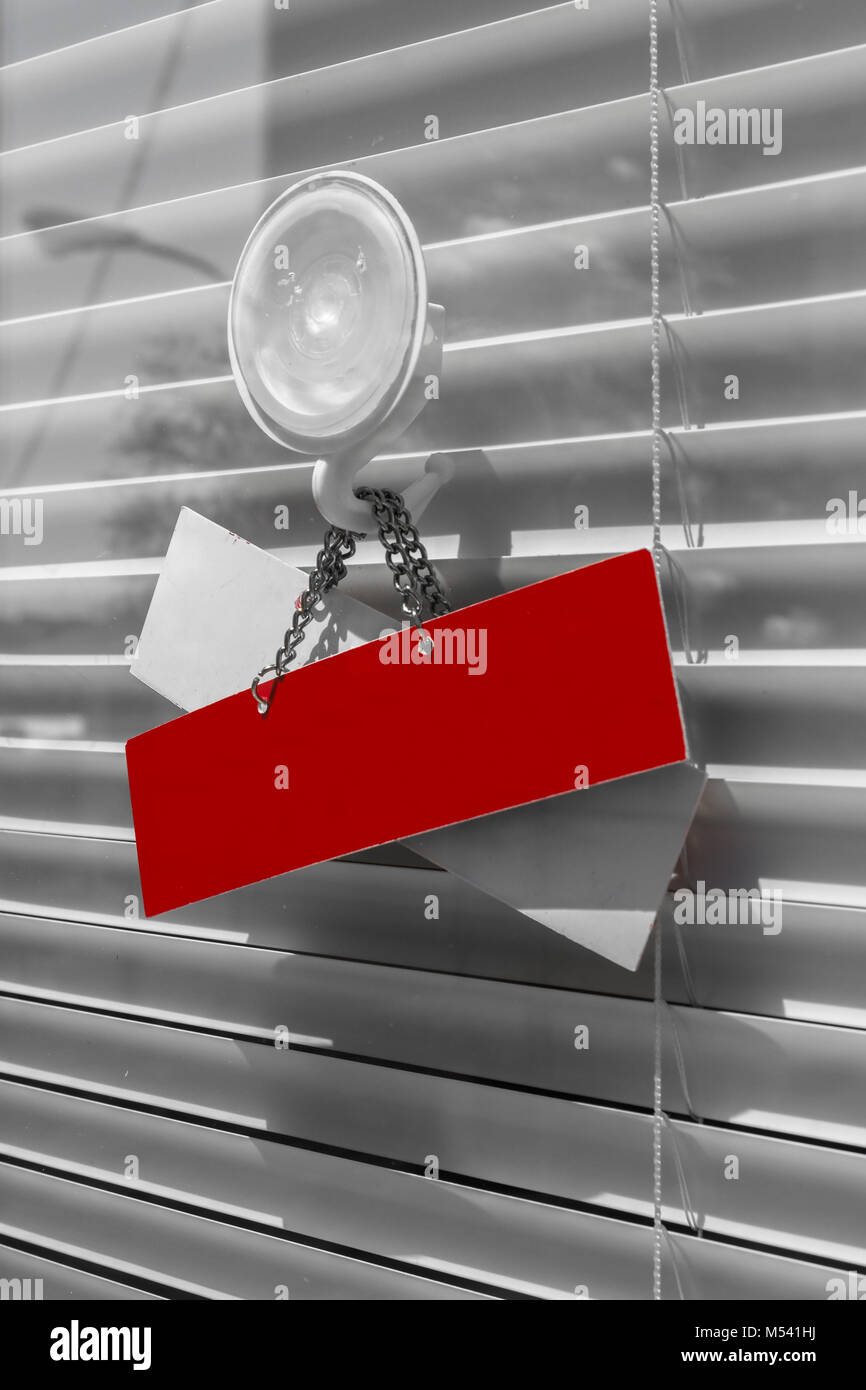 Red cartel on a glass door Stock Photo - Alamy