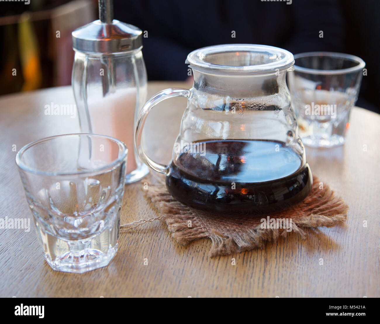 cup of coffee on the table in the cafeteria Stock Photo - Alamy
