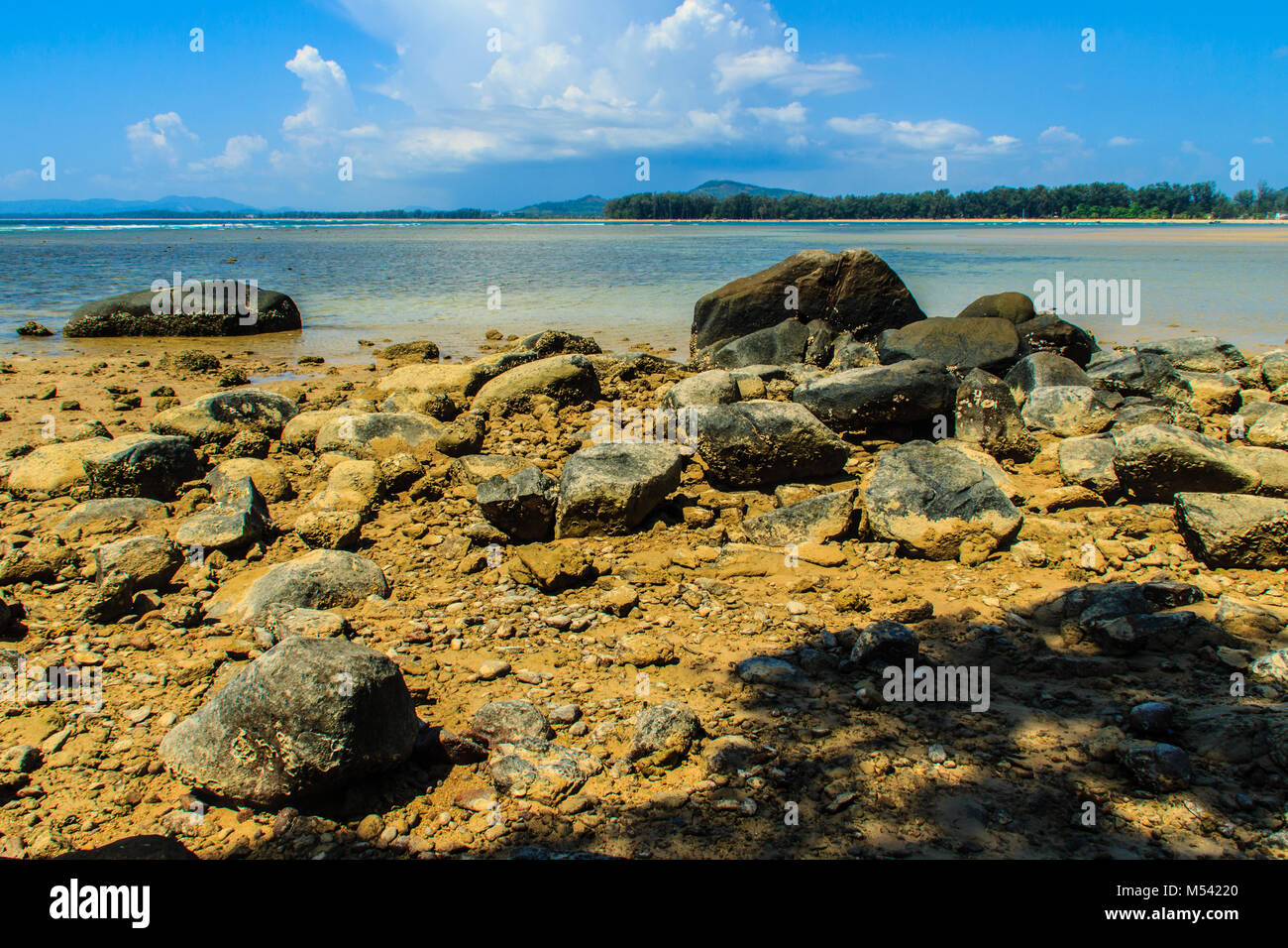 Beautiful rock stones on the beach when the sea water receded with ...