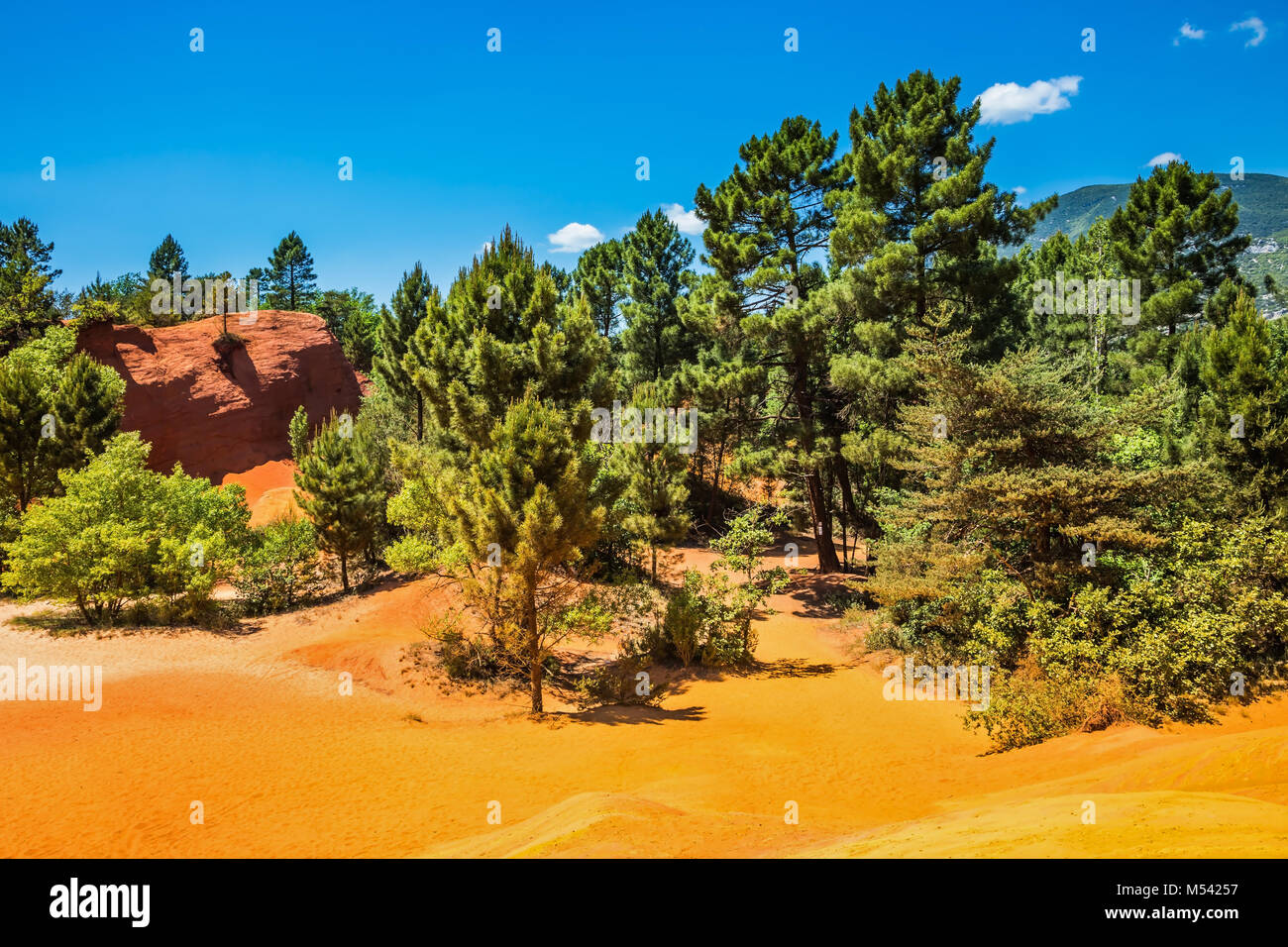 The orange-yellow hills of natural dye Stock Photo - Alamy