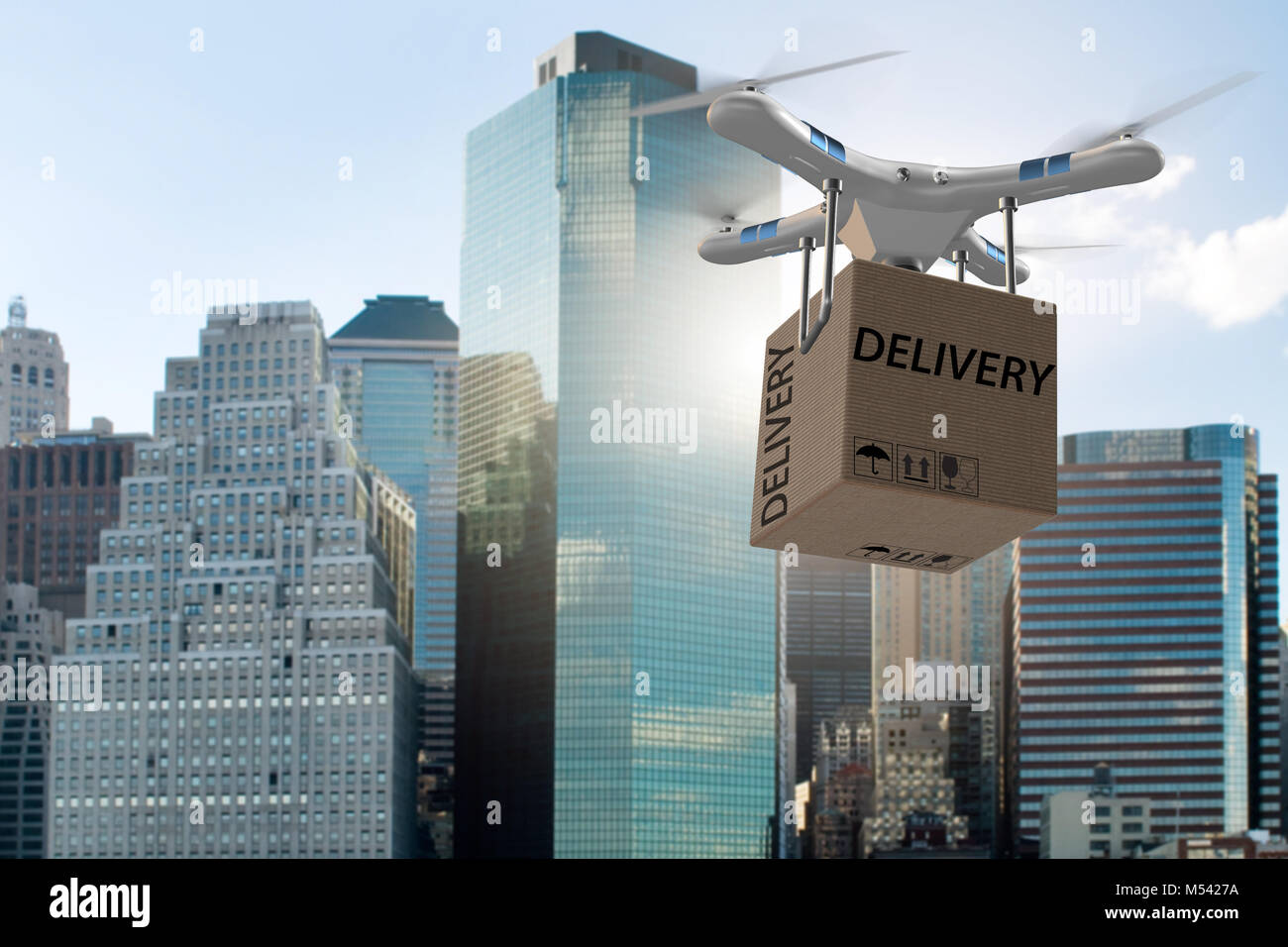 Drone delivery concept with box in air Stock Photo - Alamy