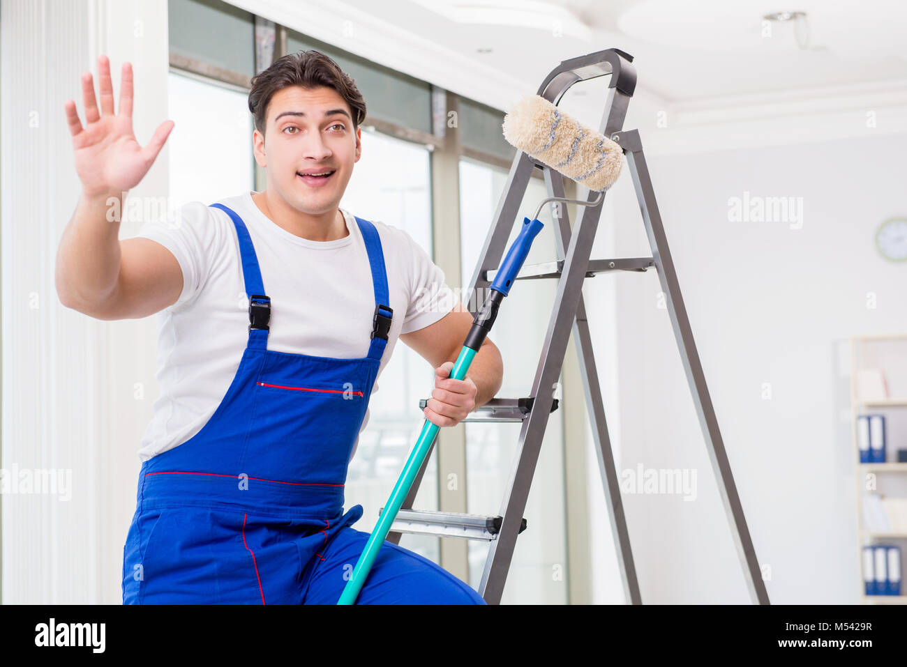 Construction worker waving hi-res stock photography and images - Alamy