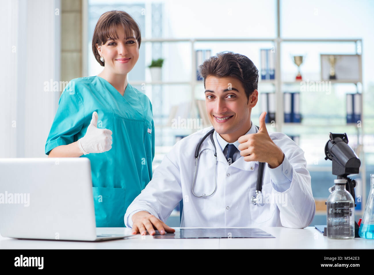 Two doctors having discussion in the hospital Stock Photo - Alamy