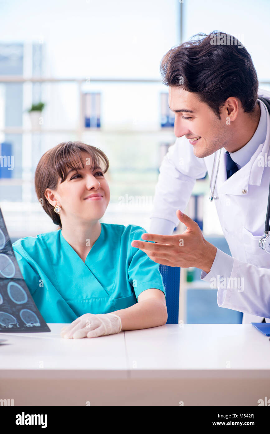 Two doctors discussing patient mri hi-res stock photography and images ...