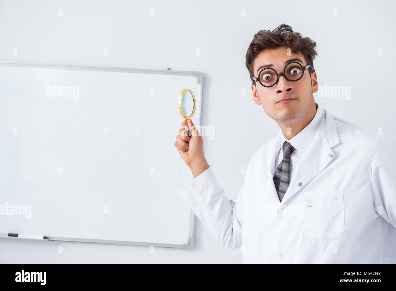 Funny doctor scientist making presentation in hospital Stock Photo - Alamy