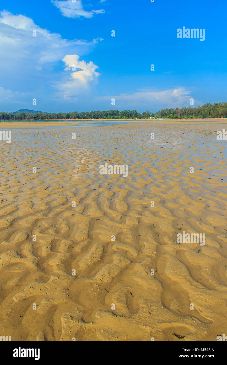 Exotic and beautiful wave pattern on the sand in the beach after sea ...