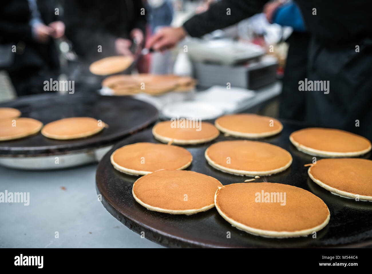 Delicious pancakes on sale on the street food market Stock Photo - Alamy