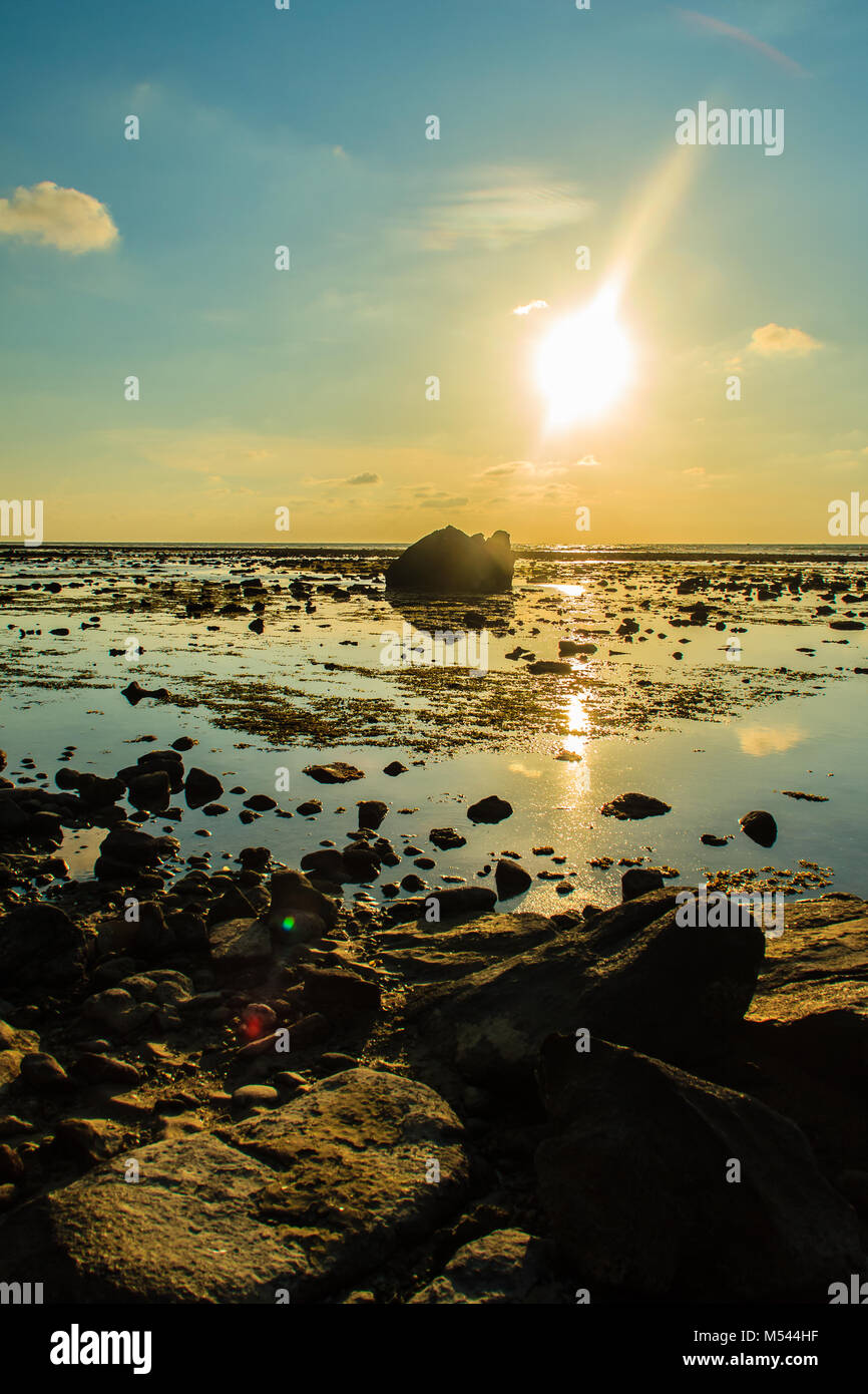 Beautiful rock stones on the beach when the sea water receded with ...