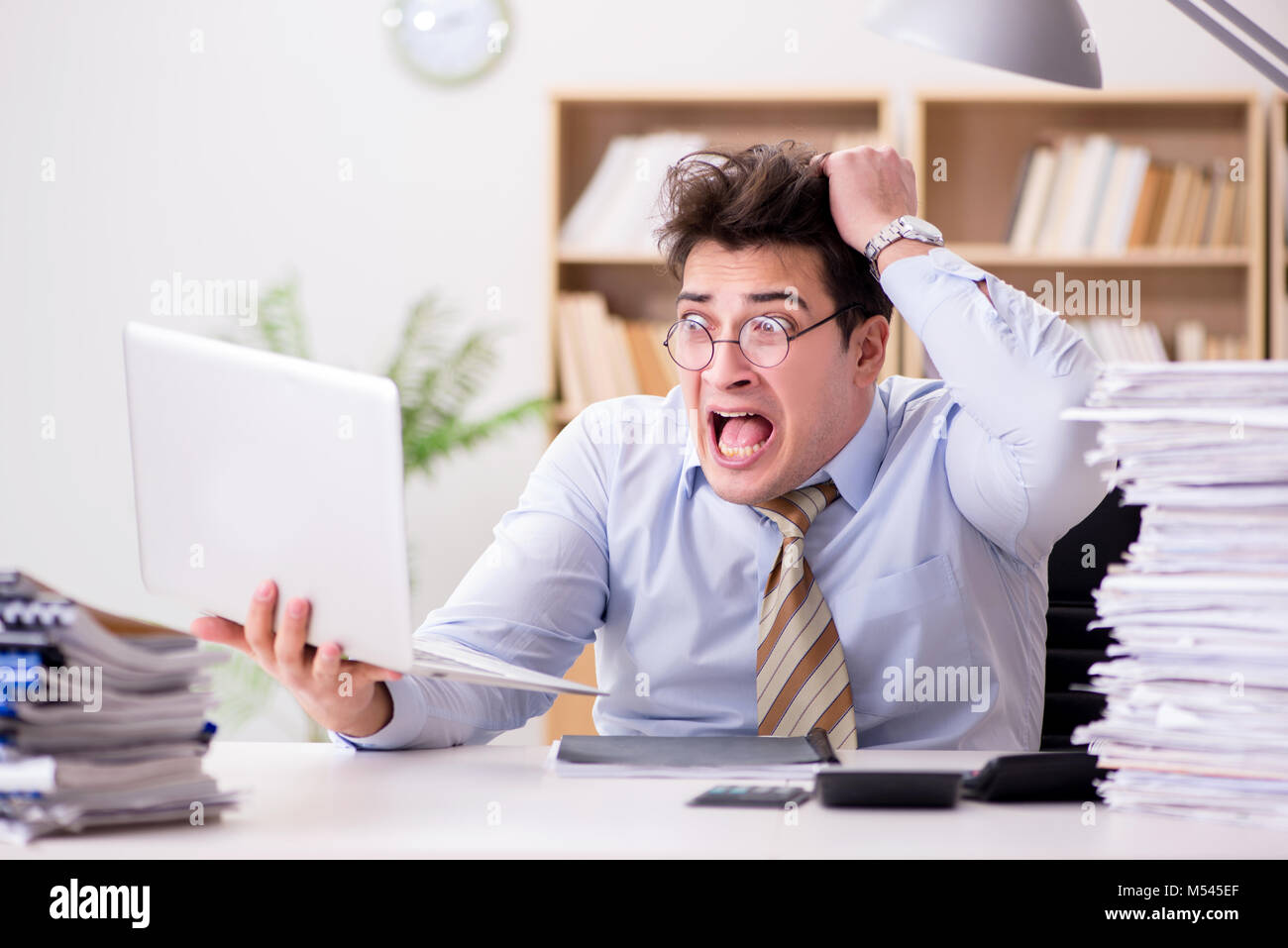 Funny accountant bookkeeper working in the office Stock Photo - Alamy