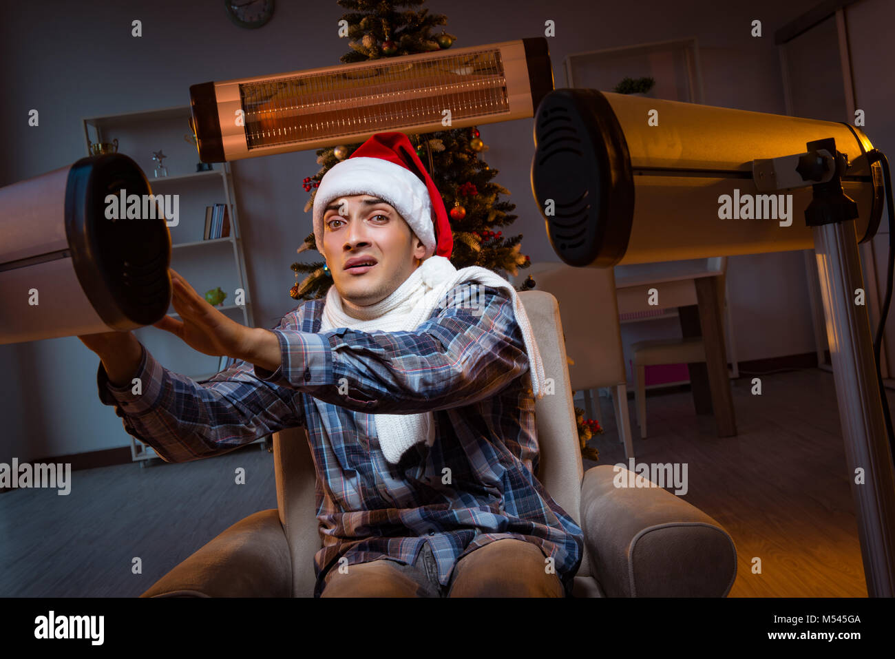 Man suffering from cold at home Stock Photo - Alamy