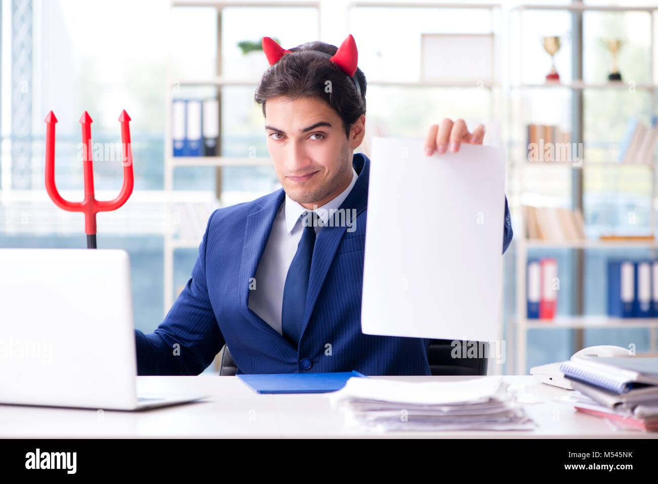 Devil angry businessman in the office Stock Photo - Alamy